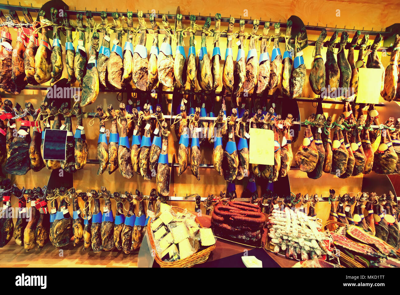 Meat at spanish market - Serrano hamon and iberico hamon Stock Photo ...