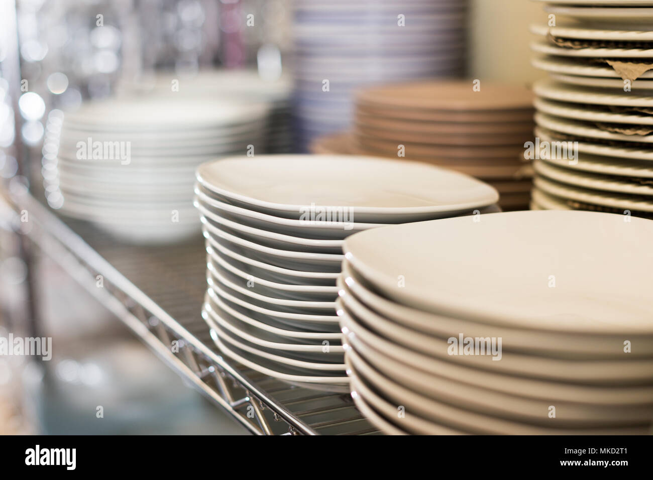 collection of plates for kitchen selling in the dishes shop Stock Photo ...