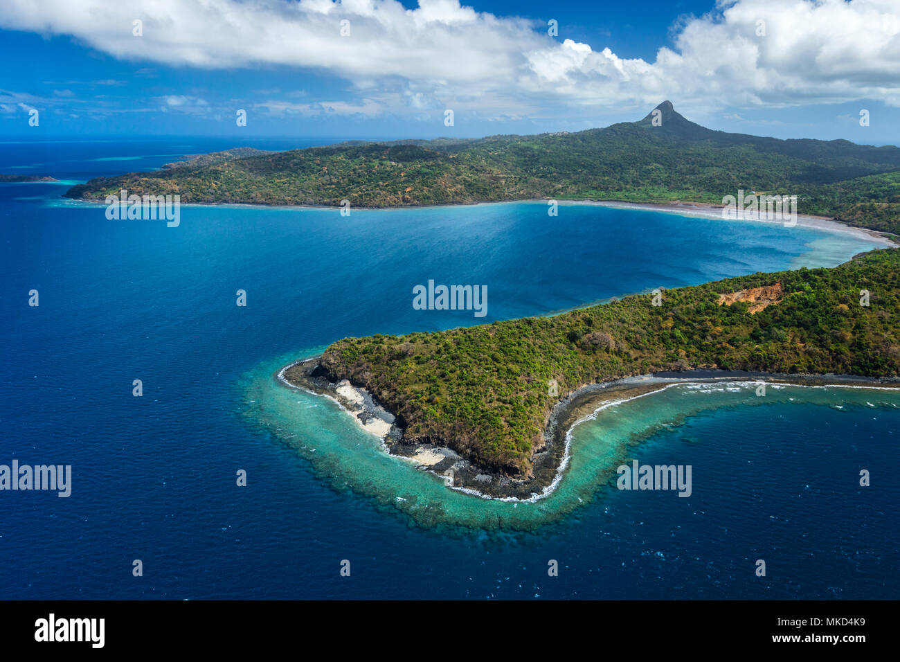 Aerial view of Saziley Point surrounded by its fringing reef. Mayotte ...