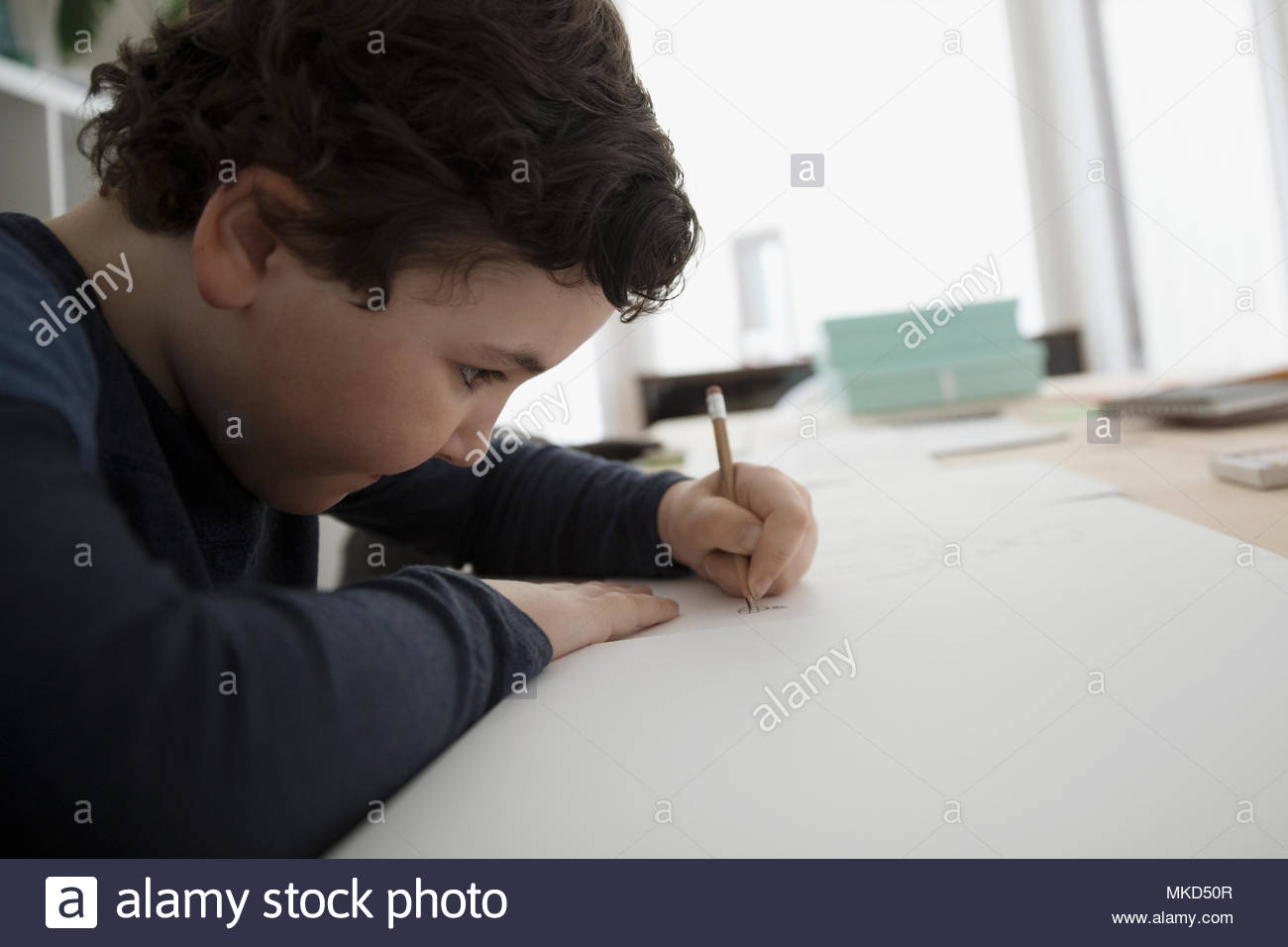 Boy with drawing hi-res stock photography and images - Alamy