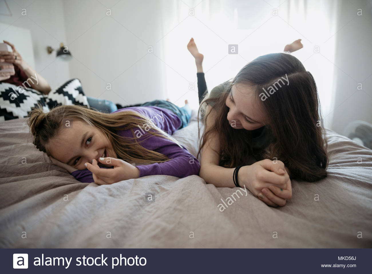 Happy family hanging out together hi-res stock photography and images ...