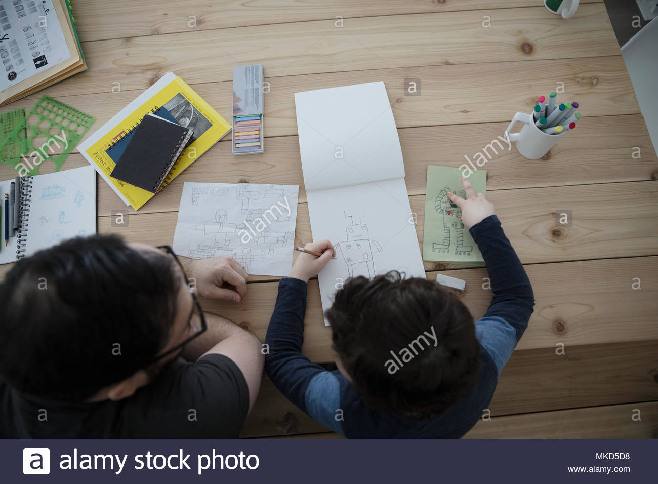 Child drawing from above hi-res stock photography and images - Alamy