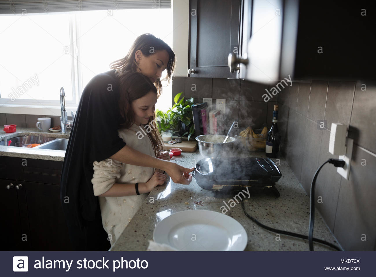 Adult showing steam to a child hi-res stock photography and images - Alamy