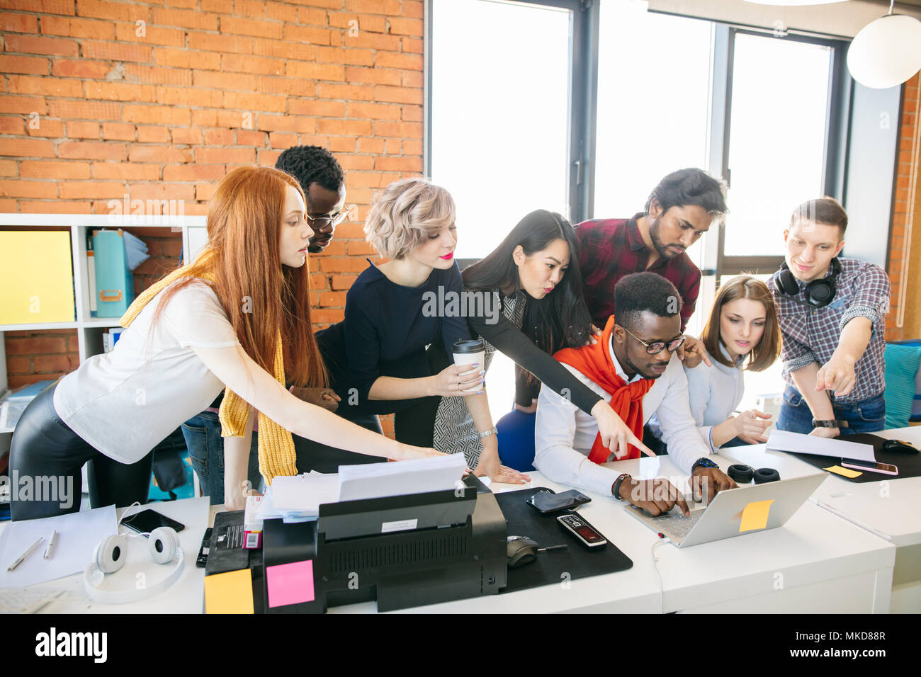 office managers are playing computer games together at work Stock Photo ...