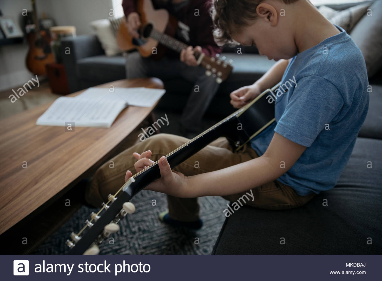Boy learning how to hi-res stock photography and images - Alamy