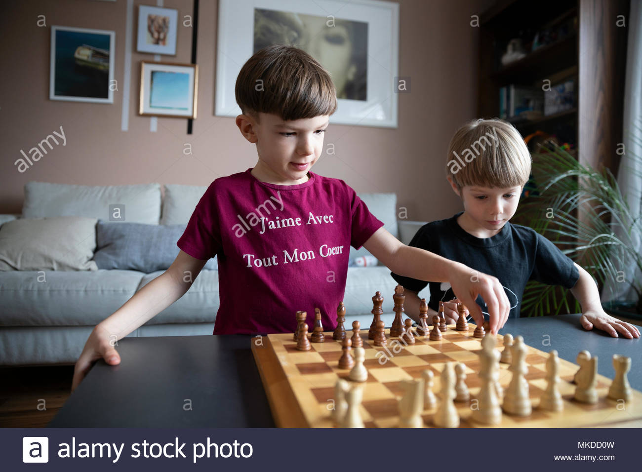 Playing chess in living room hi-res stock photography and images - Alamy