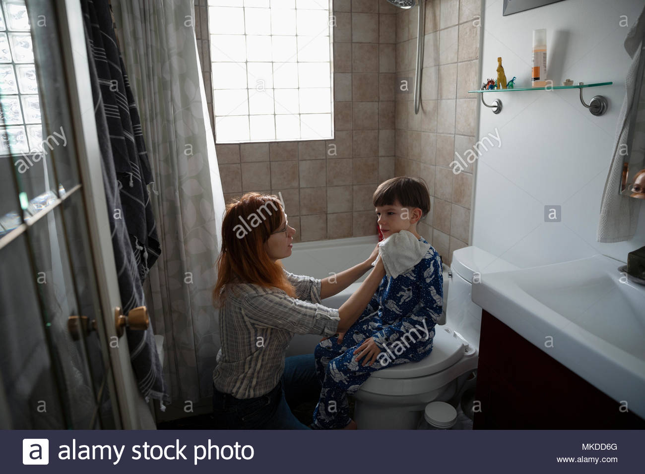 Mother washing adult son High Resolution Stock Photography and Images ...
