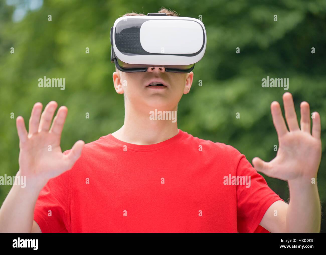 Teen boy with VR glasses Stock Photo - Alamy