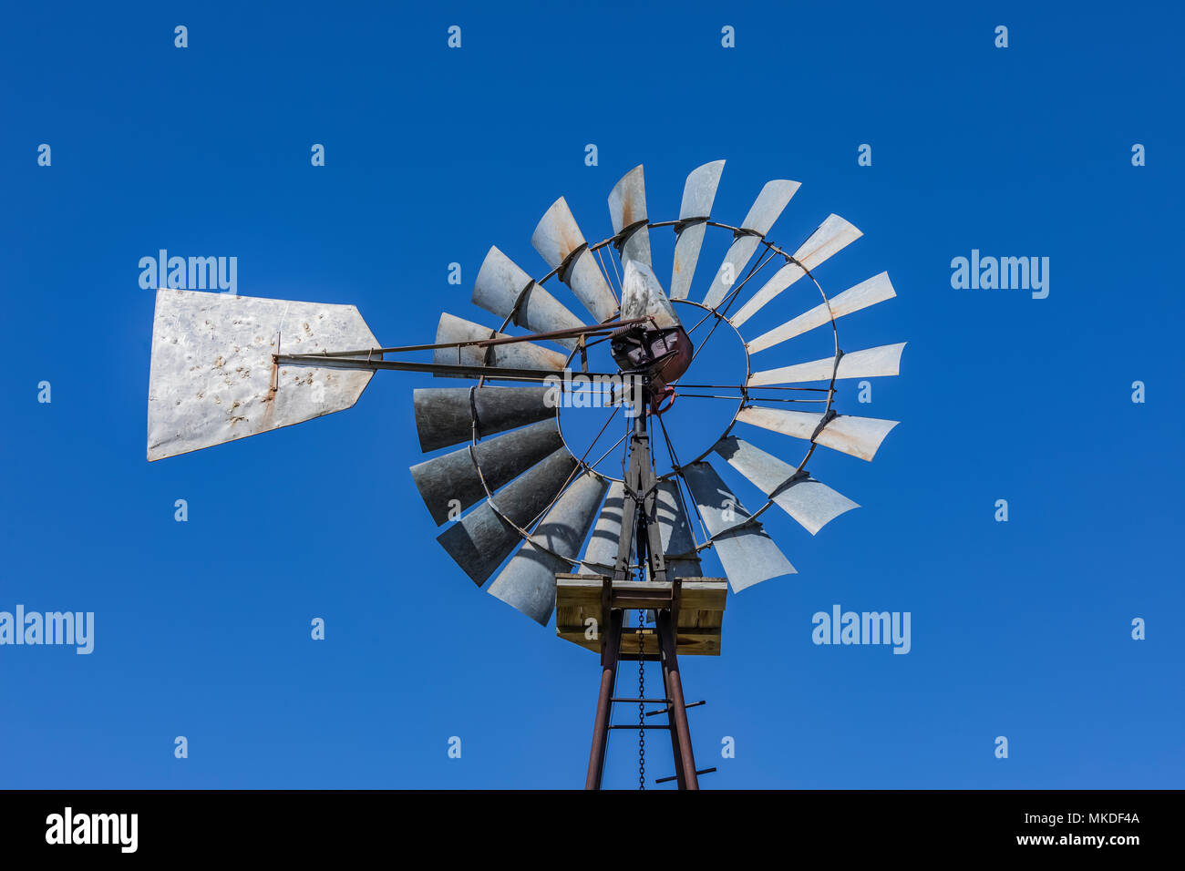 Iconic windmill used for pumping water on grasslands in Nebraska ...