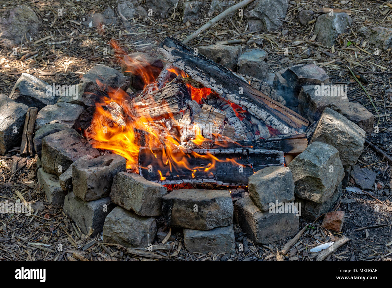 A Campfire site with stone border Stock Photo - Alamy