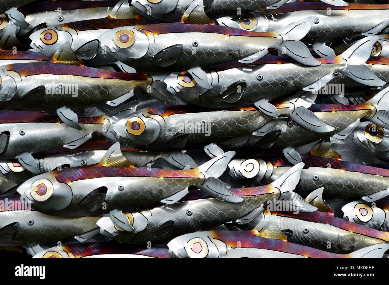 Group of metal fish Stock Photo - Alamy
