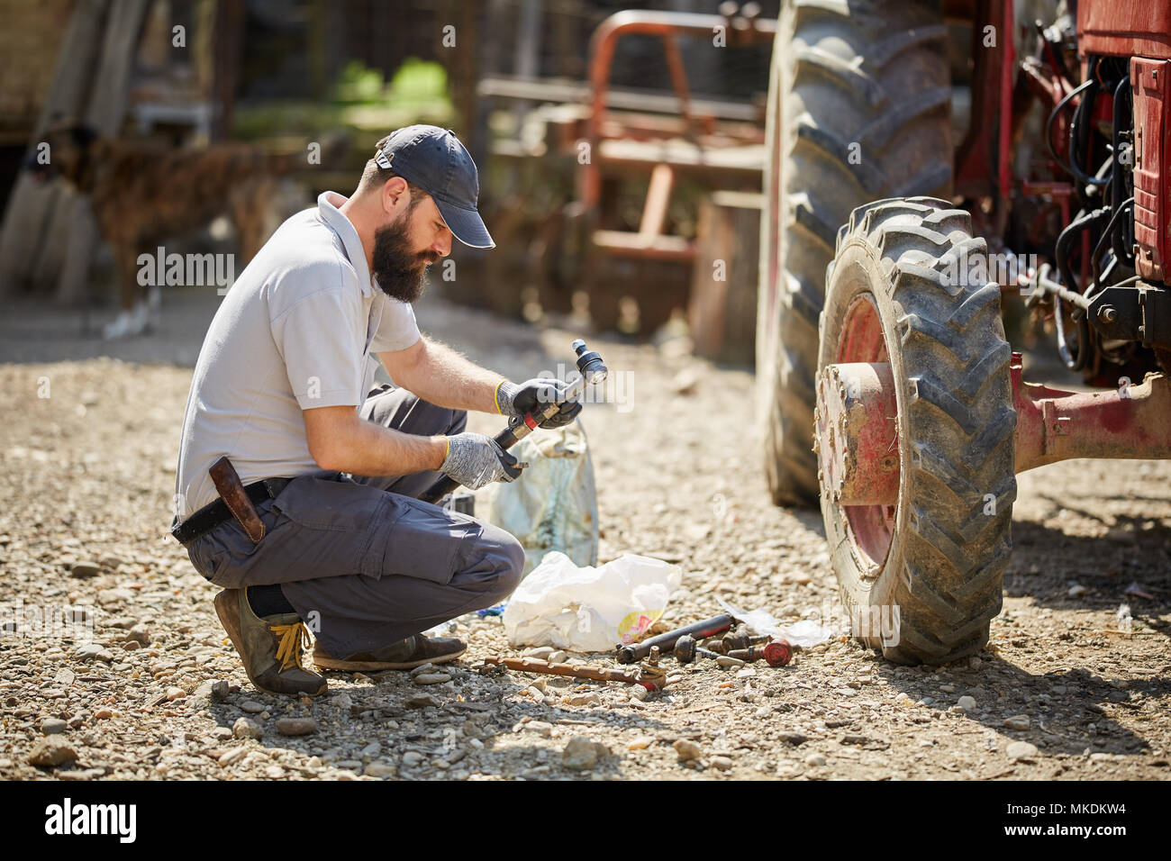 Young mechanic tractor hi-res stock photography and images - Alamy