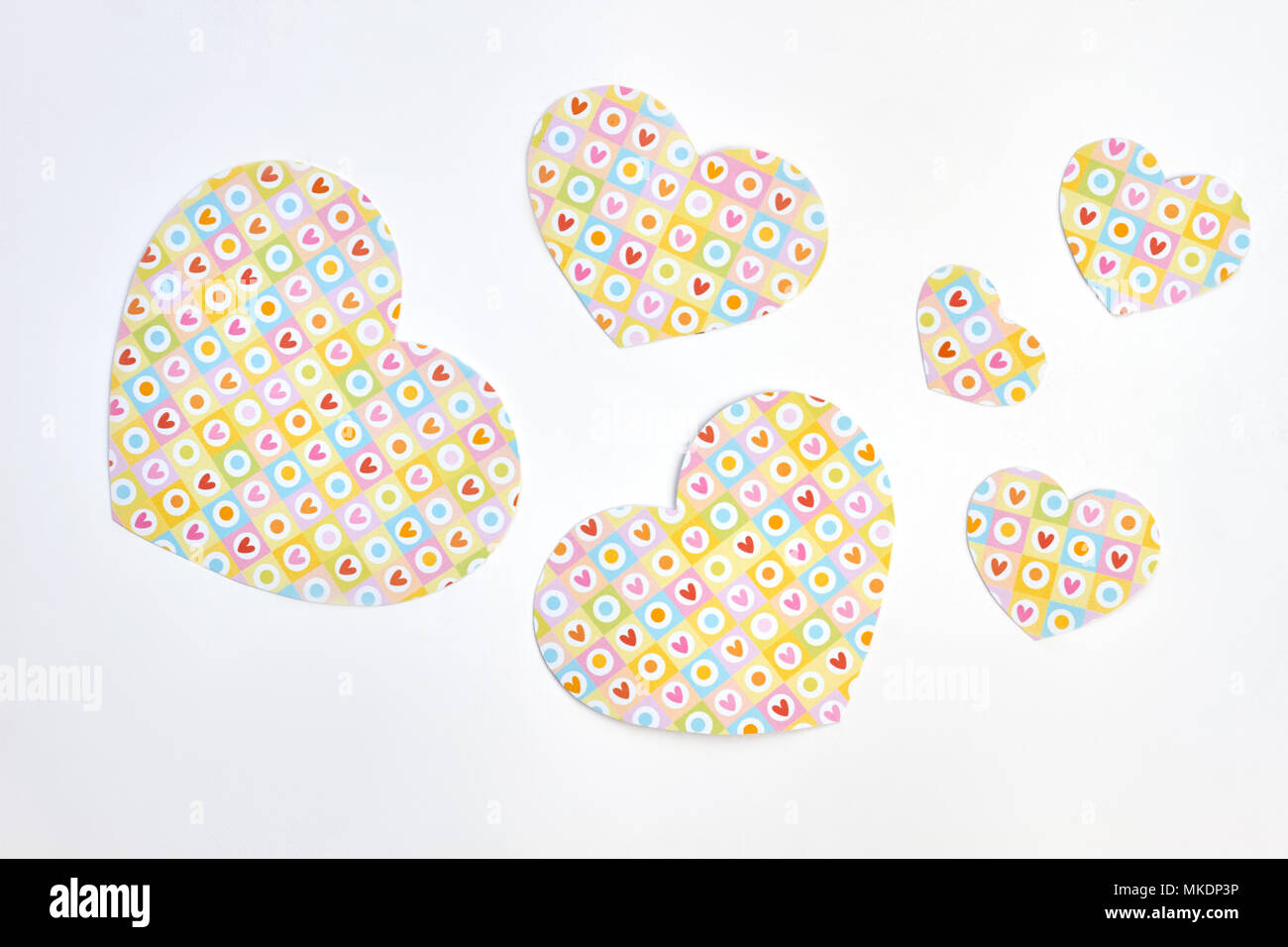 Paper figures in shape of hearts. Collection of patterned paper hearts ...