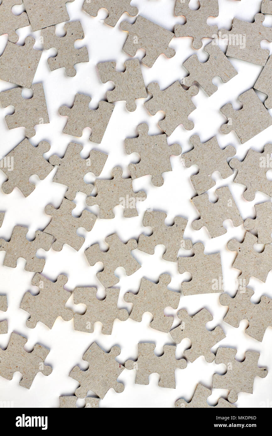 Grey puzzle pieces hi-res stock photography and images - Alamy