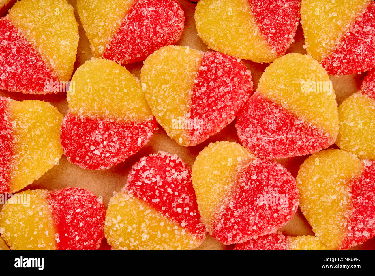 Jelly heart shaped candies background. Close up background of sugar ...
