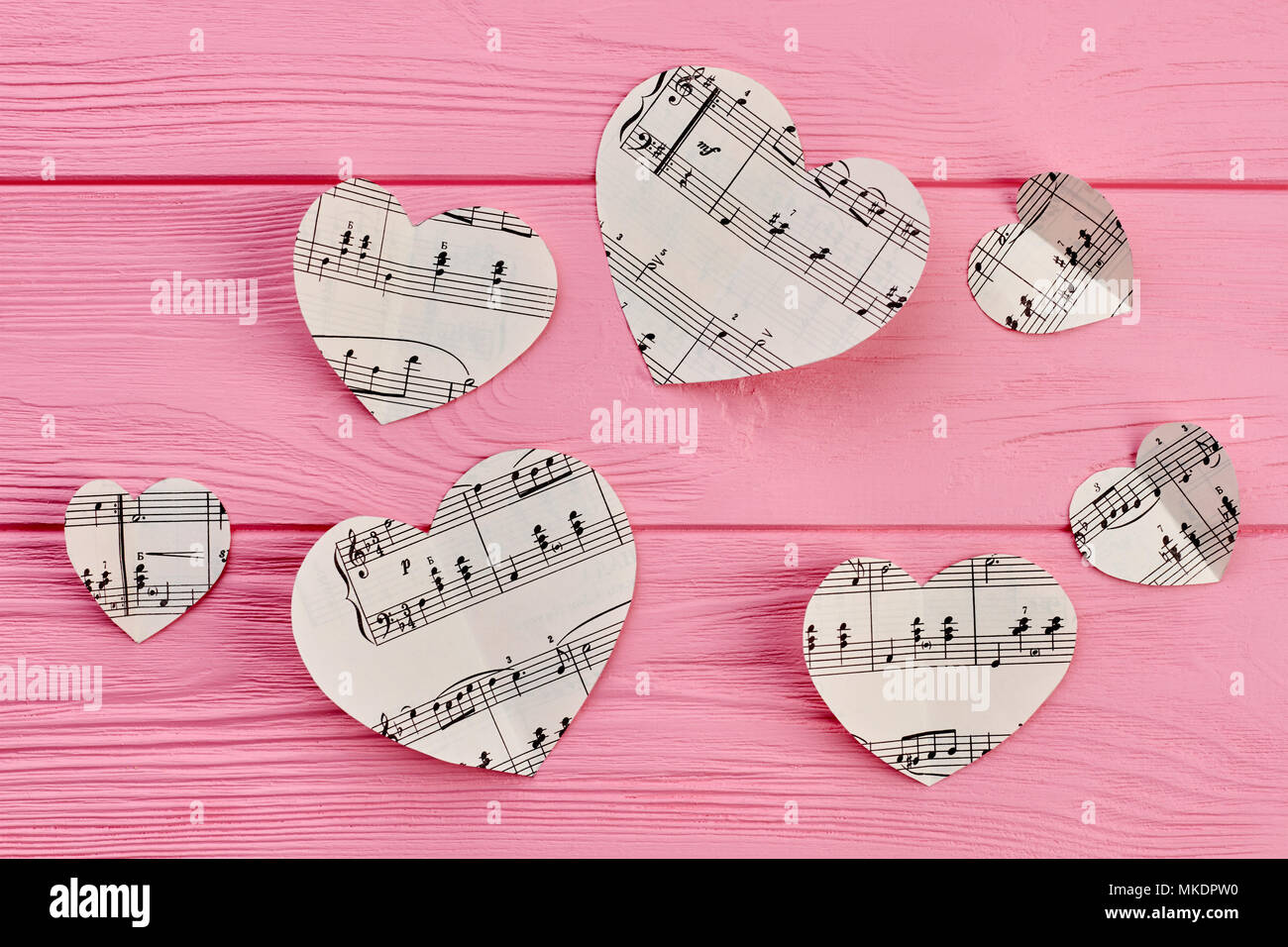 Valentines Day background with music notes. Set of white paper heart ...