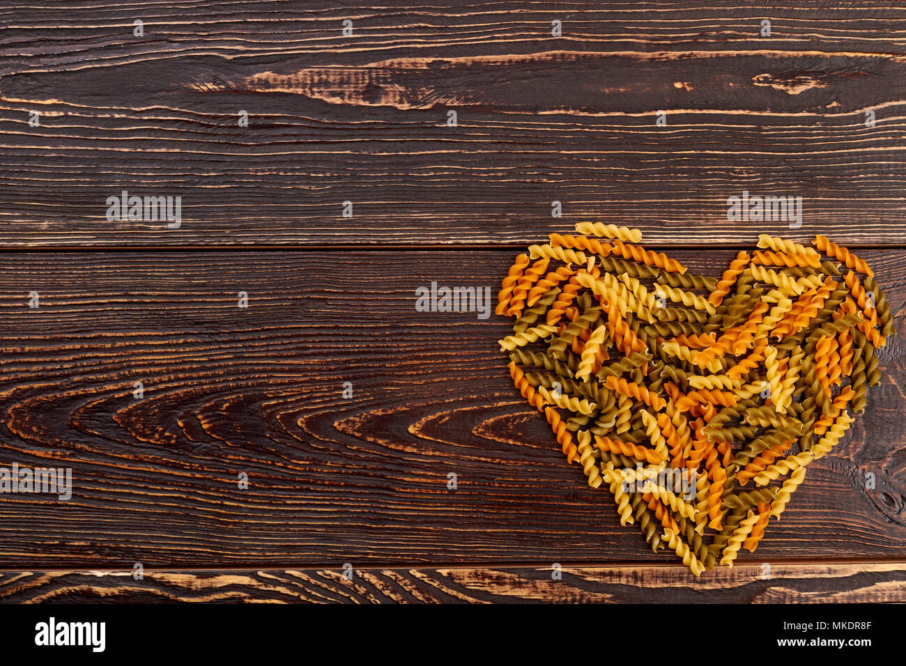Heart made from multicolored fusilli macaroni. Shape of heart from ...