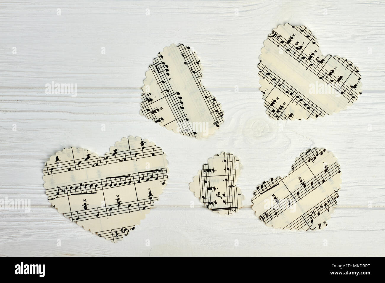 Paper hearts with musical notes. Set of paper hearts with musical notes ...