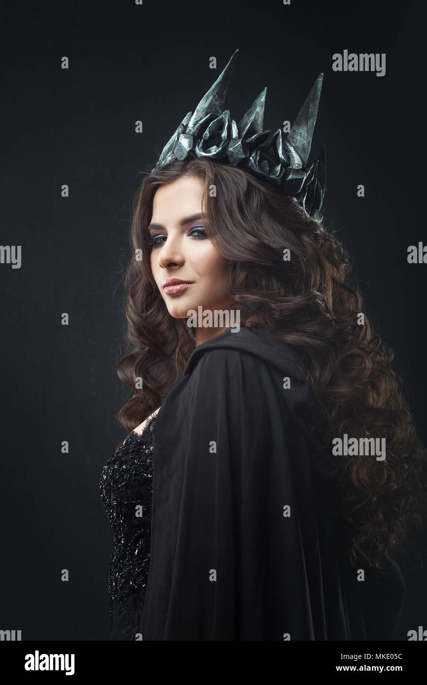Portrait of a Gothic Princess. Beautiful young brunette woman in metal ...