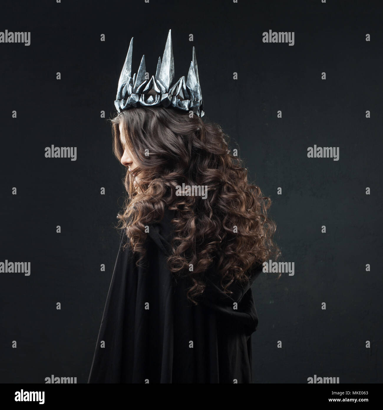 Portrait of a Gothic Princess. Beautiful young brunette woman in metal ...