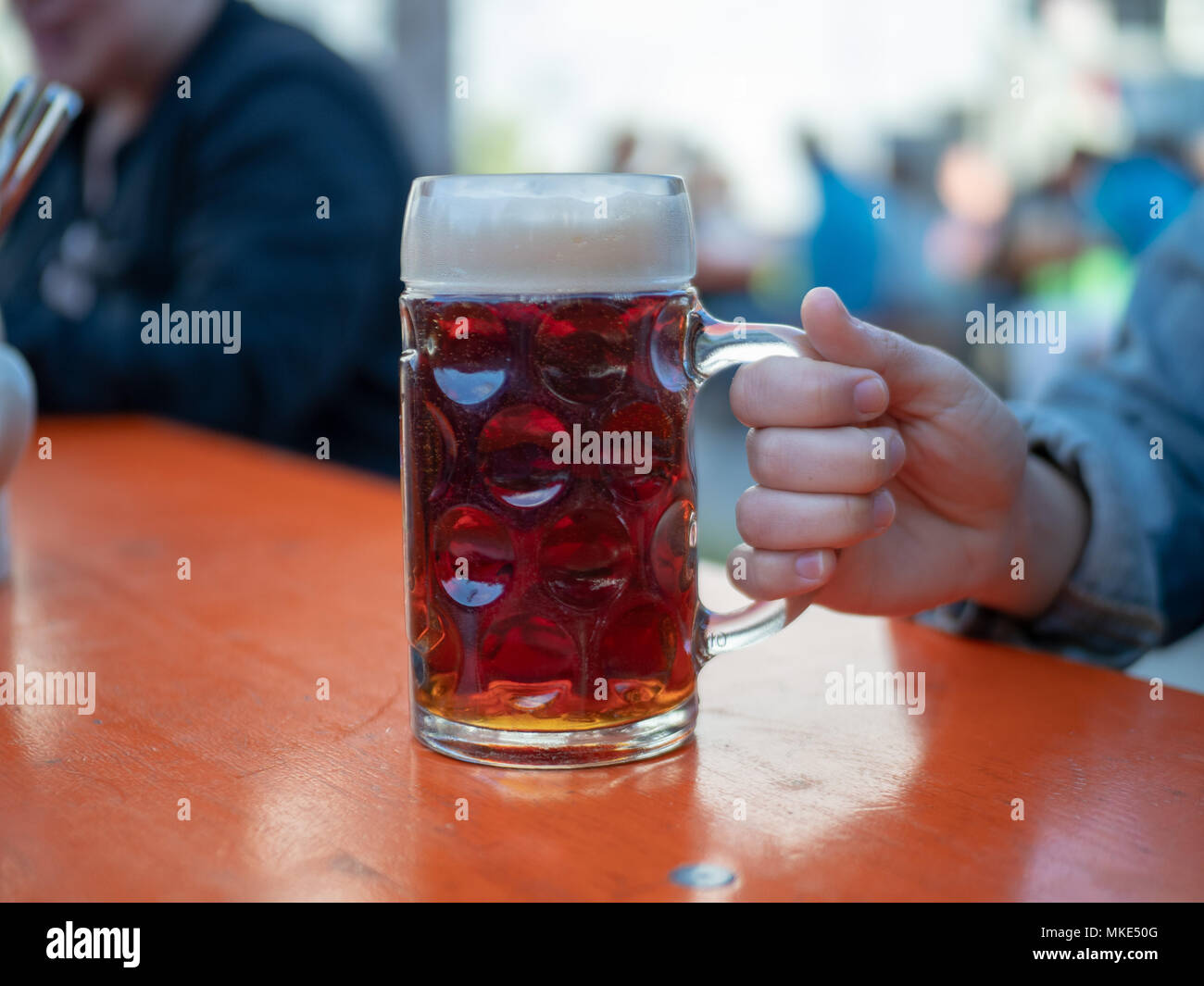 Woman pint beer crowd hi-res stock photography and images - Alamy