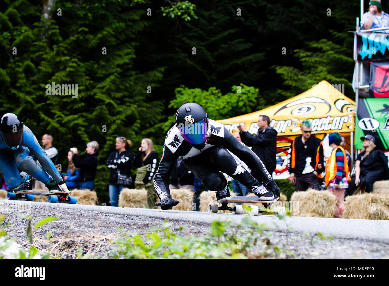 Long boarding down-hill where a longboarder may reach speeds in excess ...