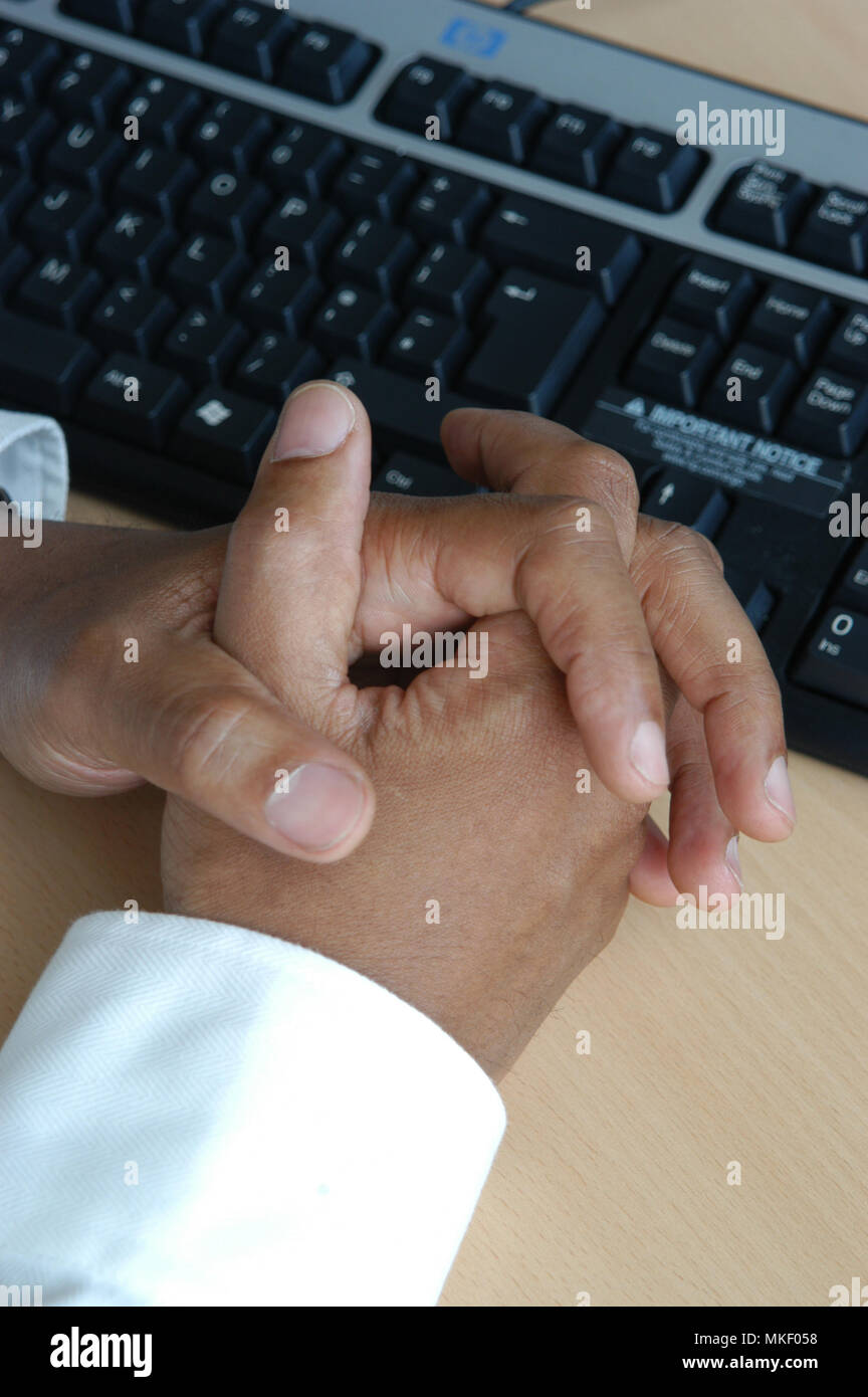close up of mans hands on office desk Stock Photo - Alamy