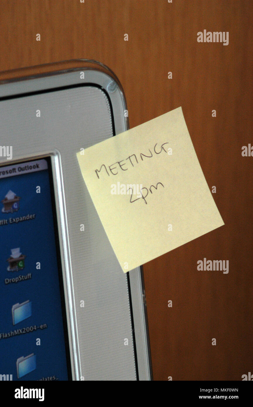 Post-it Note sticky note reminders stuck on office desks in the city ...