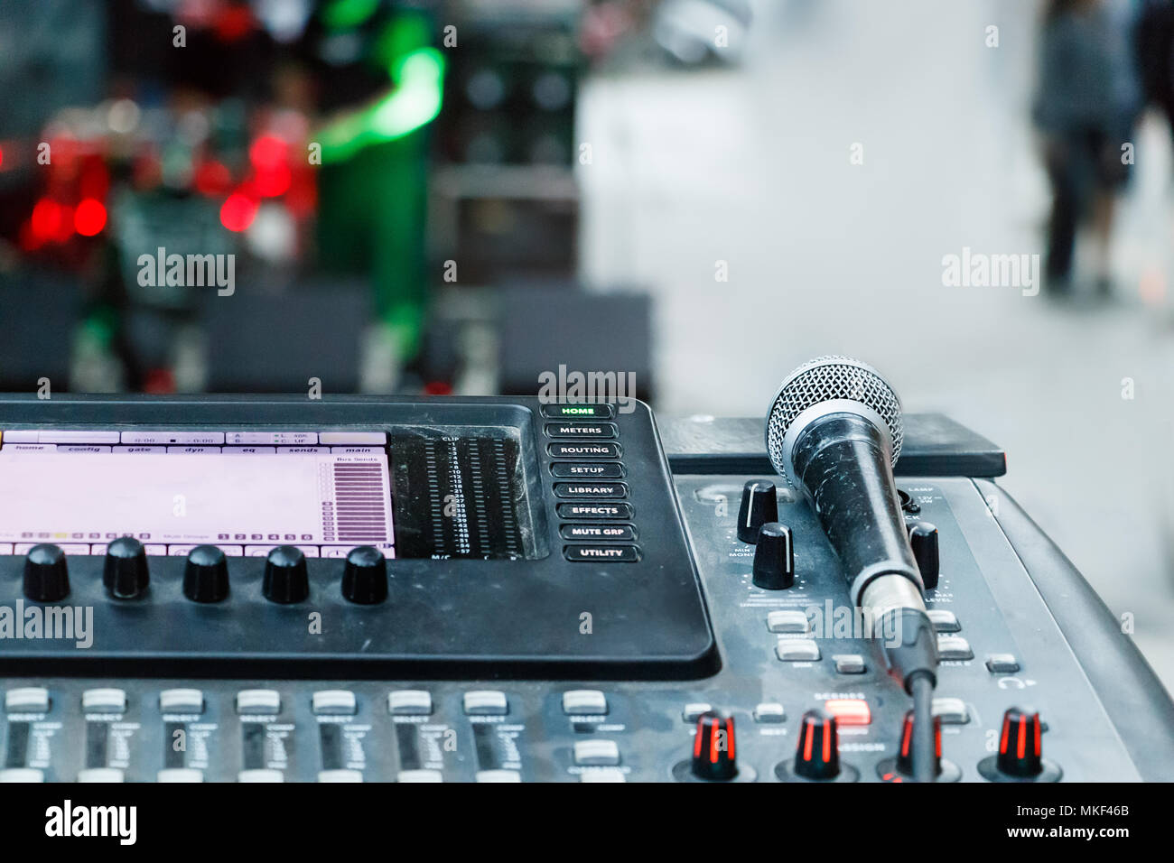 Detail of a sound mixer and a microphone placed outdoors, natural light ...