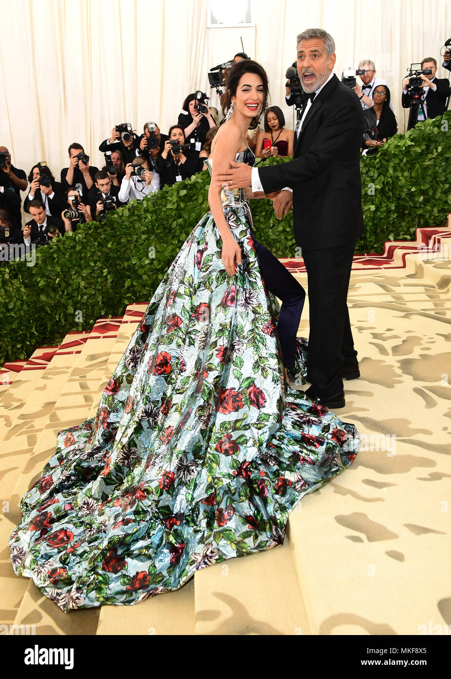 Amal and George Clooney attending the Metropolitan Museum of Art ...