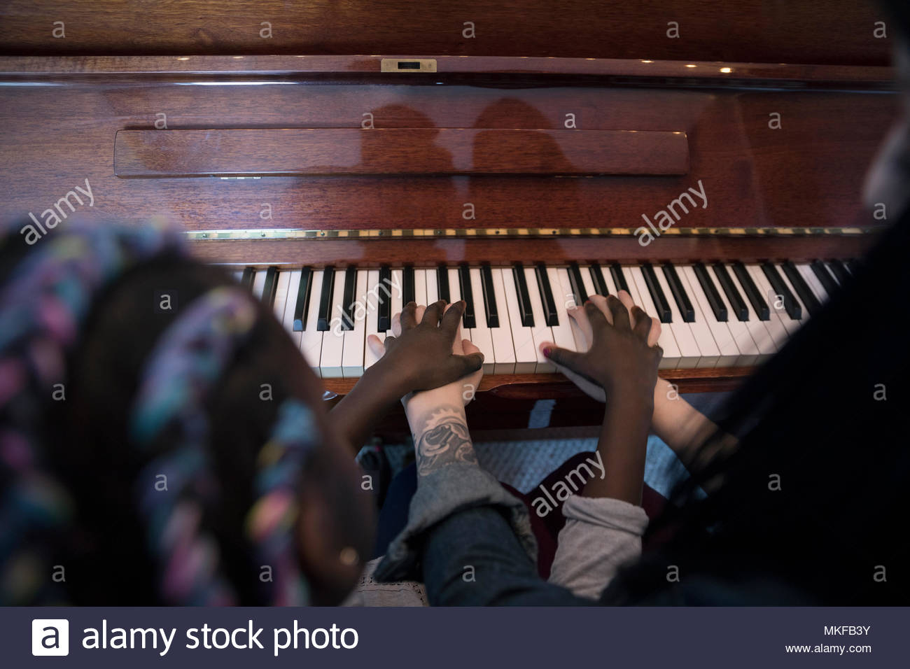 Hands on piano overhead hi-res stock photography and images - Alamy