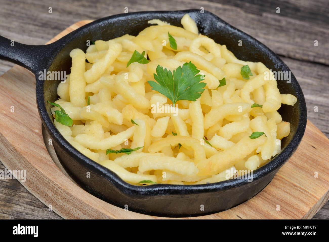 Cutting spaetzle hi-res stock photography and images - Alamy