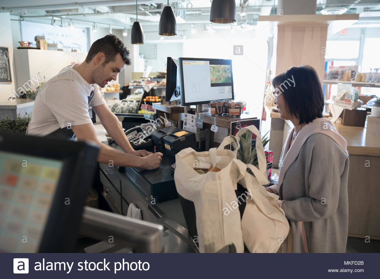 Bagging grocery checkout hi-res stock photography and images - Alamy