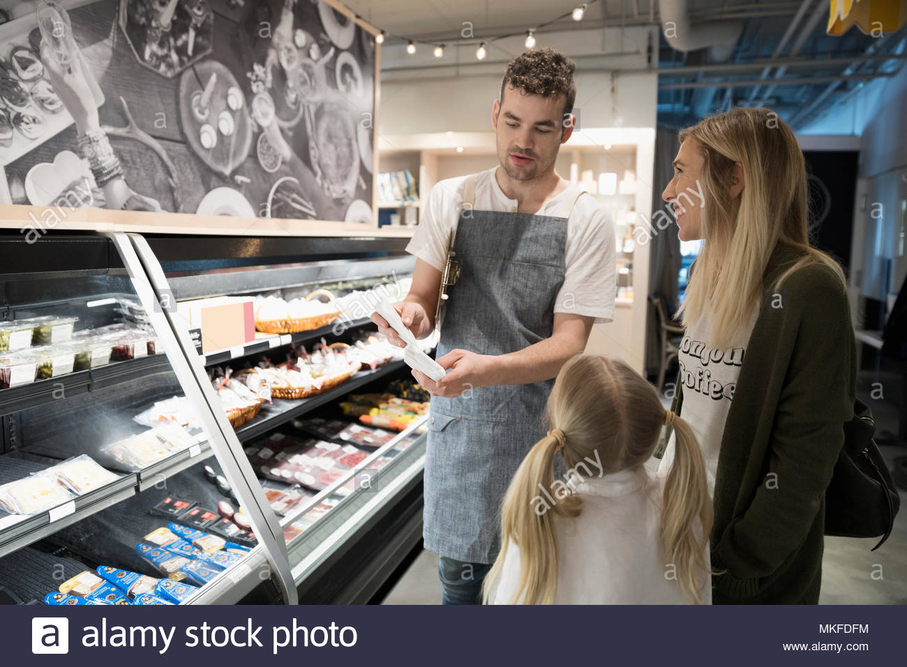 Happy family shopping in grocery store hi-res stock photography and ...