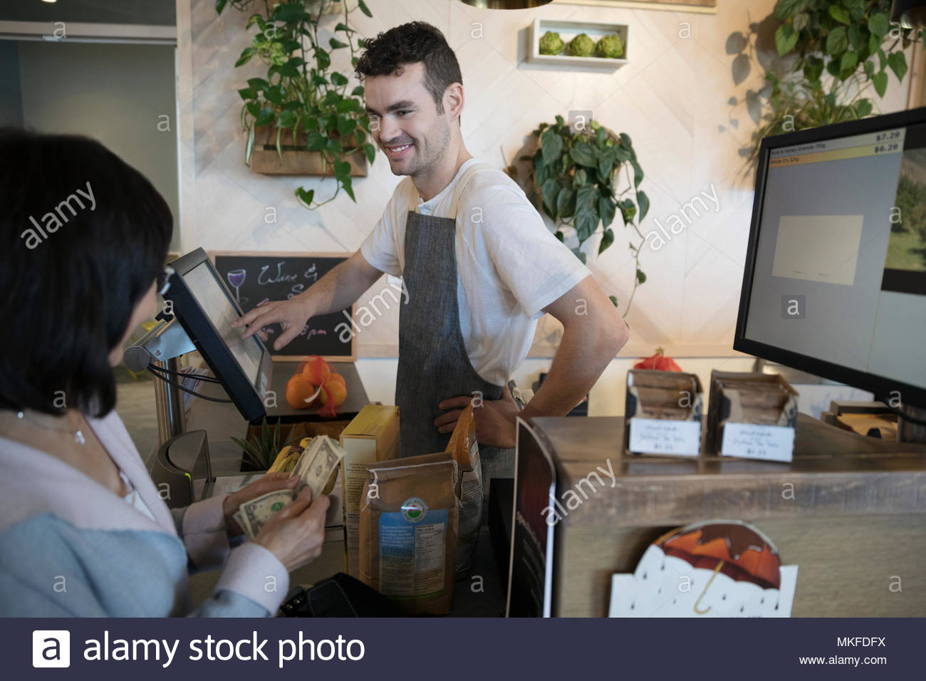 Man cash register hi-res stock photography and images - Alamy