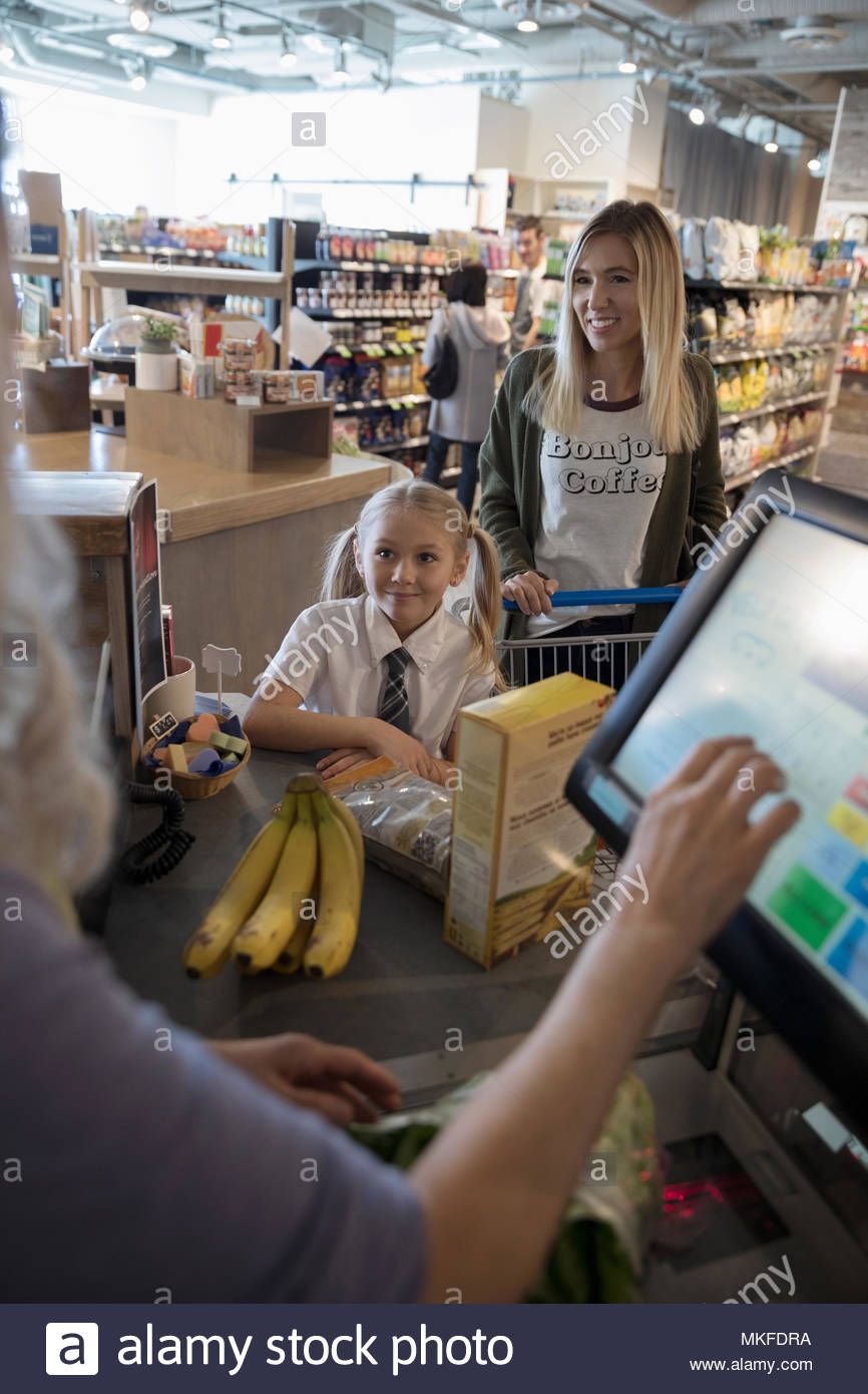 Family shopping at supermarket cashier hi-res stock photography and ...