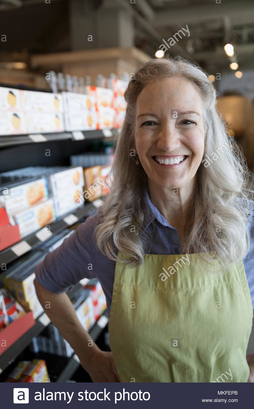 Working in a supermarket senior person hi-res stock photography and ...