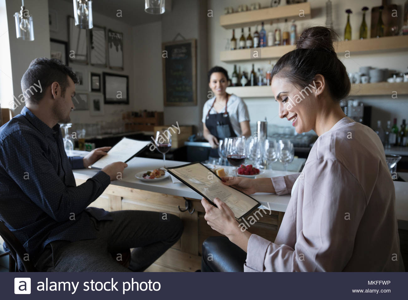 Man reading menu hi-res stock photography and images - Alamy