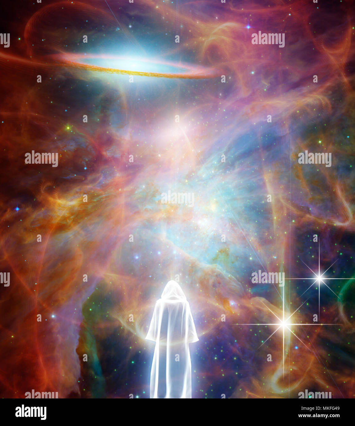 Figure in white cloak in universe Stock Photo - Alamy