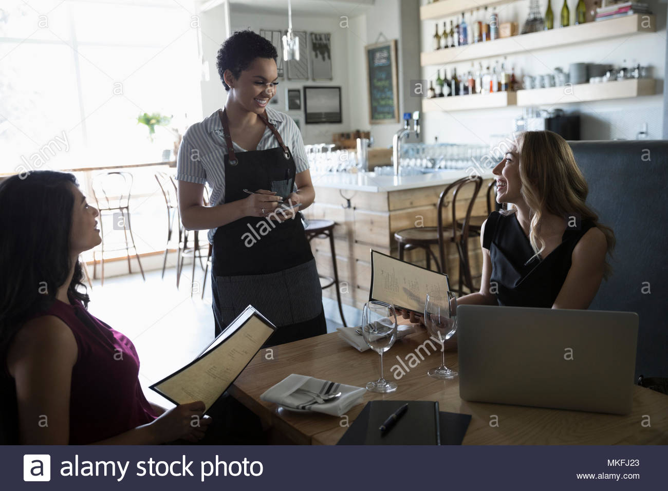 Ordering Food Restaurant Stock Photos & Ordering Food Restaurant Stock ...