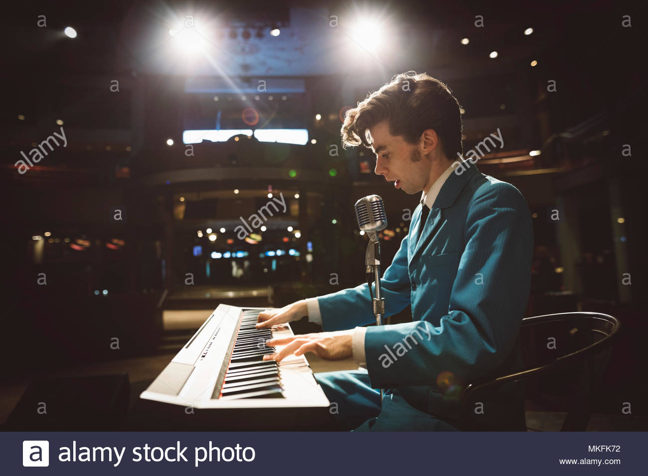 Playing electric piano hi-res stock photography and images - Alamy