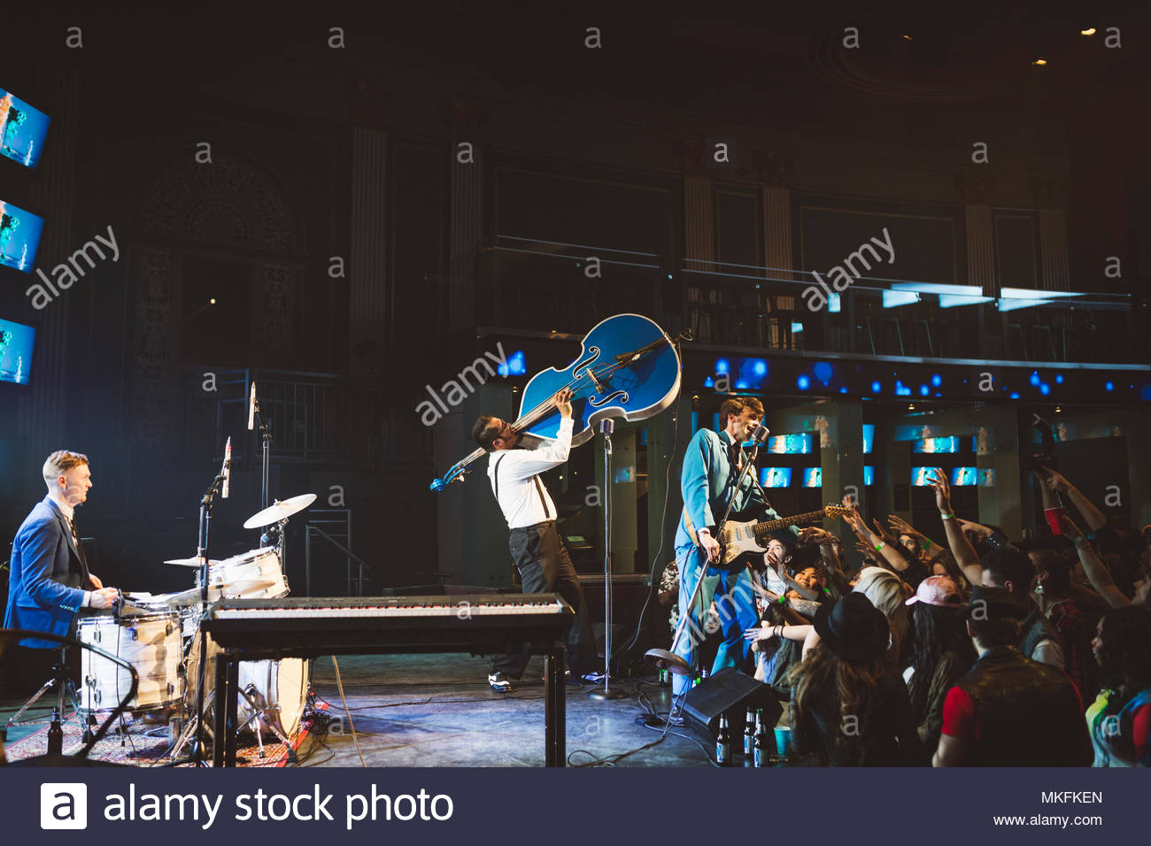 Exuberant crowd holding hi-res stock photography and images - Alamy