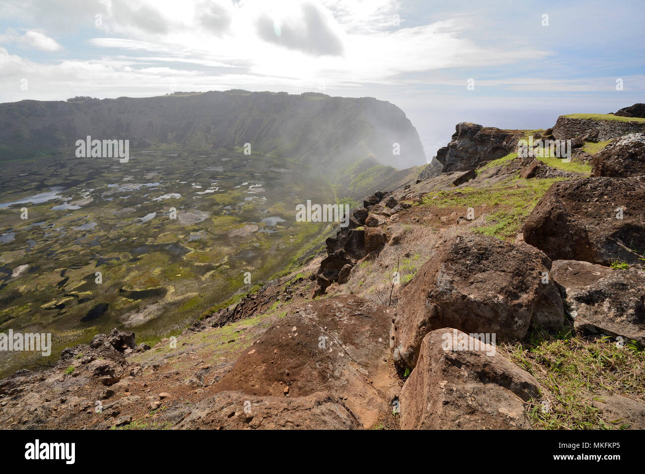 Crater of the extinct volcano Rano Kau seen from the stone village of ...