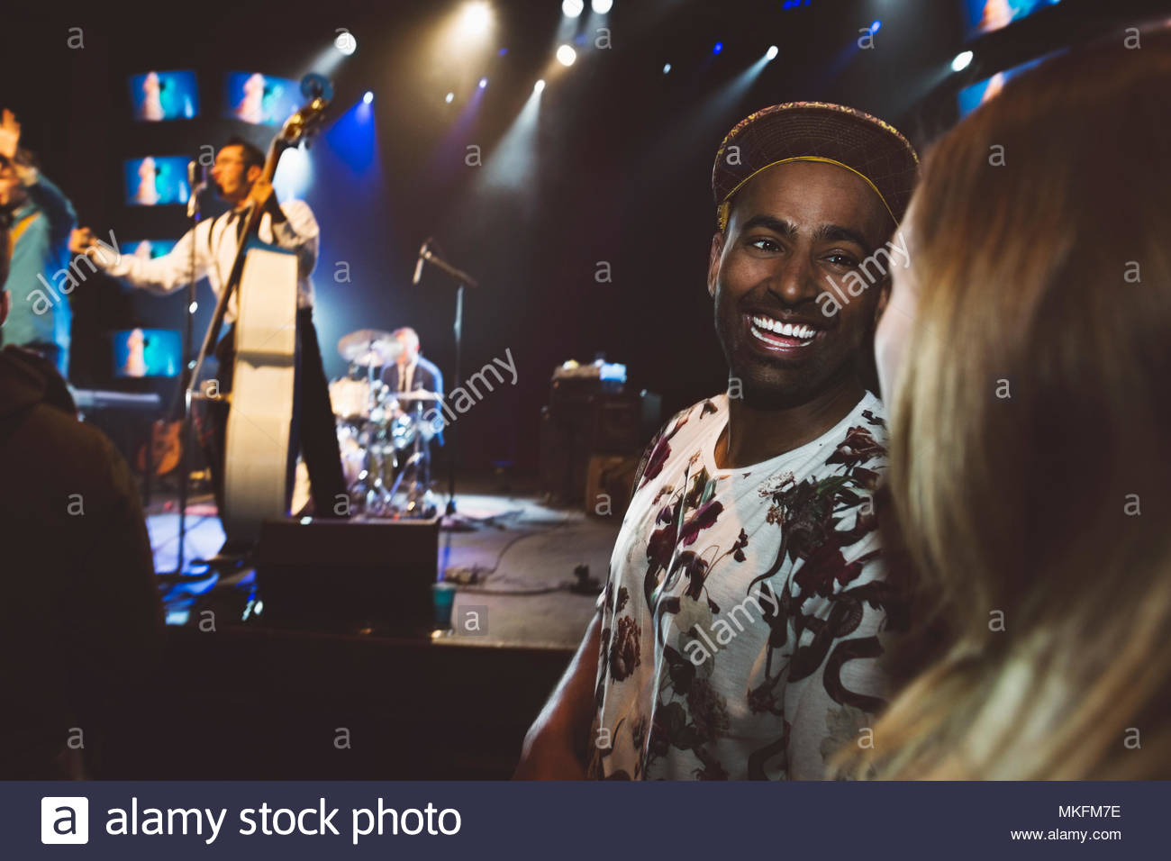 Two male audience at concert hi-res stock photography and images - Alamy