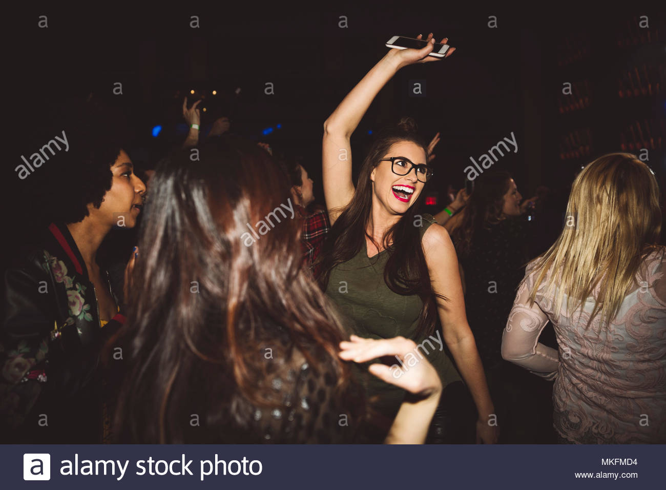 Woman standing happy party hi-res stock photography and images - Alamy