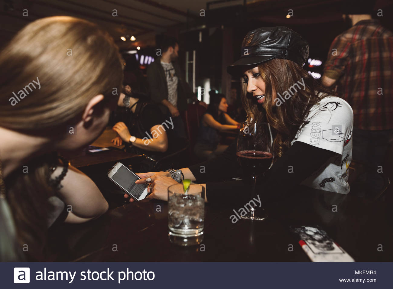 Girls in a bar drinking hi-res stock photography and images - Alamy