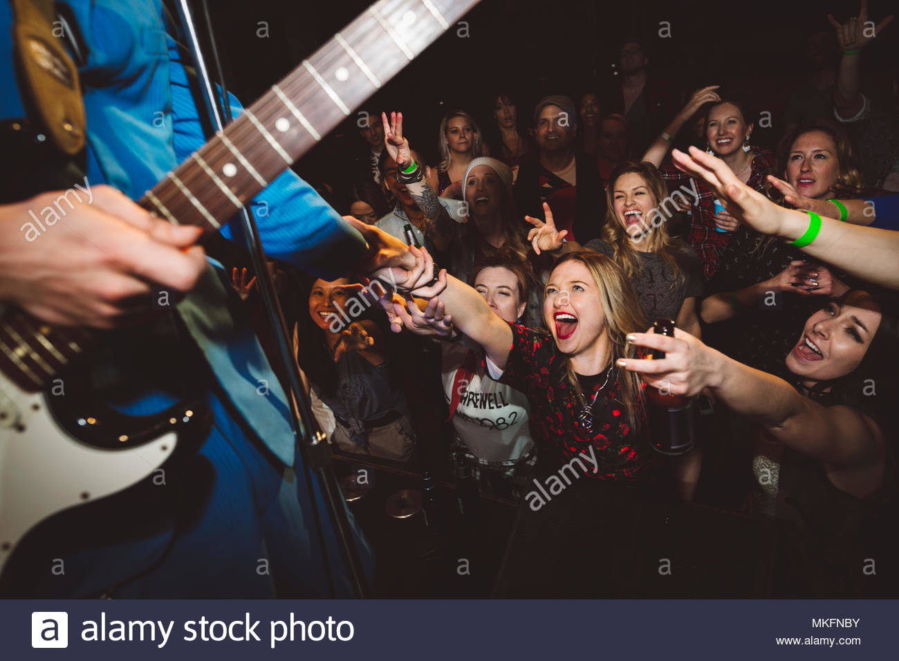 Crowd touching audience hi-res stock photography and images - Alamy