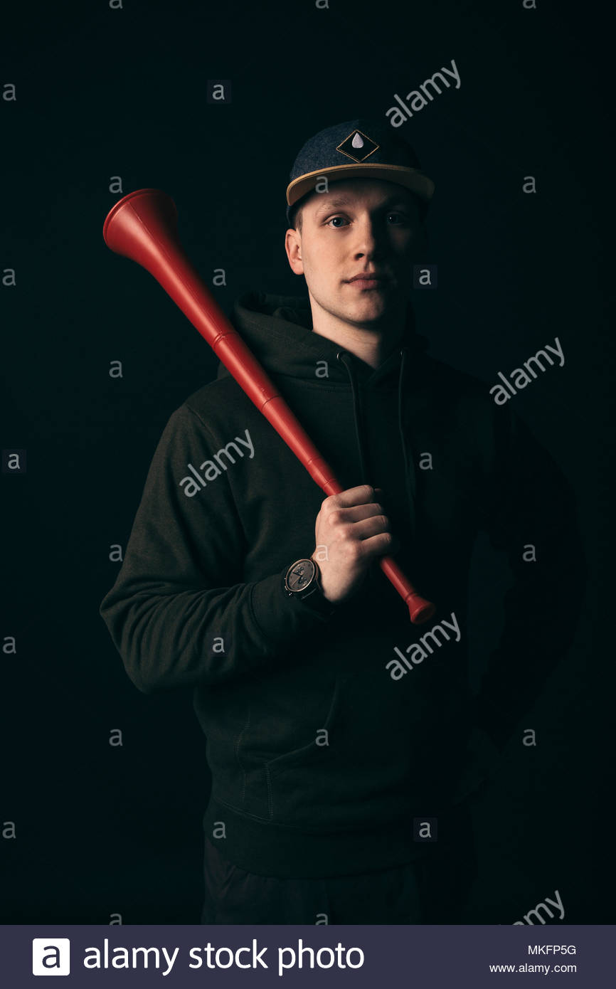 Renaissance portrait confident young male millennial sports fan holding ...