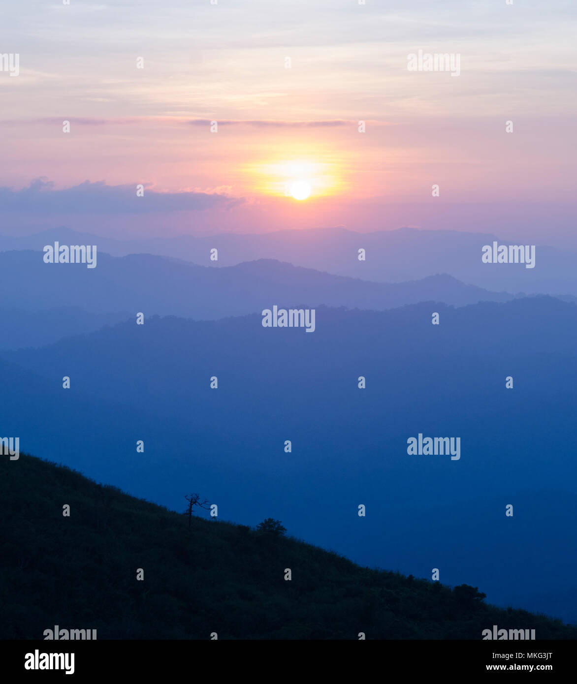 Sunset in the mountain Stock Photo - Alamy