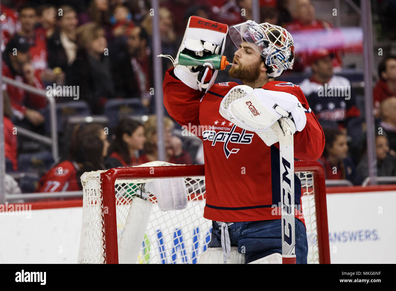 Washington Capitals goaltender Braden Holtby (70) takes a drink of ...